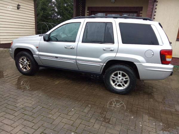 Grey Jeep Grand Cherokee 2003 in Klaipeda, with an engine capacity of 2.70 L and mileage of 288 thousand km for 2400 €, photo 5 on AUTOMOTO.COM.LV