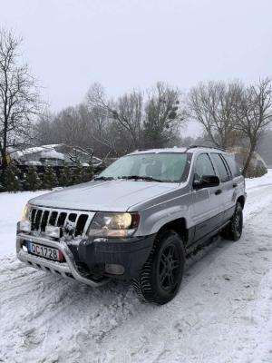 Grey Jeep Grand Cherokee 2003 in Kaunas, with an engine capacity of 2.69 L and mileage of 320 thousand km for 3900 €, photo  on AUTOMOTO.COM.LV