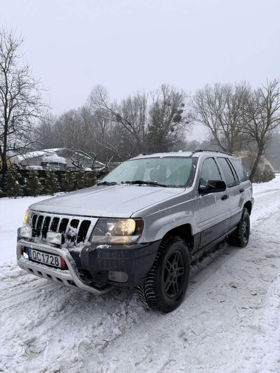 Grey Jeep Grand Cherokee 2003 in Kaunas, with an engine capacity of 2.69 L and mileage of 320 thousand km for 3900 €, photo 1 on AUTOMOTO.COM.LV