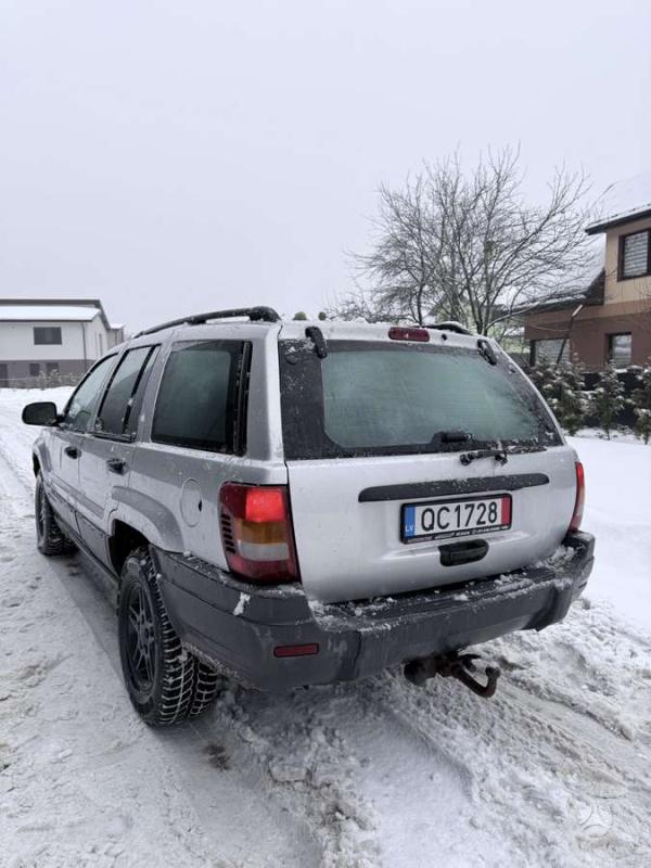 Grey Jeep Grand Cherokee 2003 in Kaunas, with an engine capacity of 2.69 L and mileage of 320 thousand km for 3900 €, photo 8 on AUTOMOTO.COM.LV