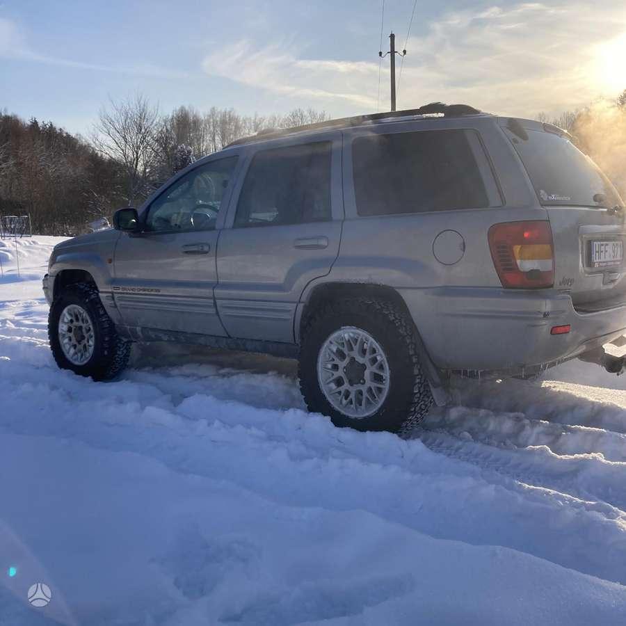 Pelēks Jeep Grand Cherokee 2003 Ignalina, ar dzinēja tilpumu 4.70 L un nobraukumu 300 tūkst. km par 6000 €, foto 6 vietnē AUTOMOTO.COM.LV