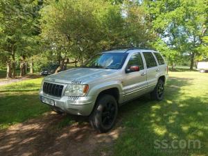 Pelēks Jeep Grand Cherokee 2003 Dobele, ar dzinēja tilpumu 2.70 L un nobraukumu 357 tūkst. km par 3200 €, foto  vietnē AUTOMOTO.COM.LV