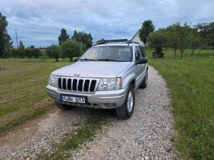 Grey Jeep Grand Cherokee 2003 in Moletai, with an engine capacity of 2.69 L and mileage of 479 thousand km for 2600 €, photo  on AUTOMOTO.COM.LV