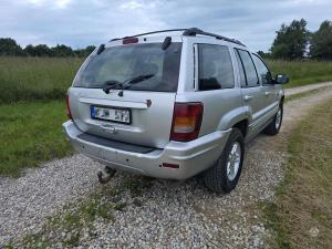 Grey Jeep Grand Cherokee 2003 in Moletai, with an engine capacity of 2.69 L and mileage of 479 thousand km for 2600 €, photo 4 on AUTOMOTO.COM.LV