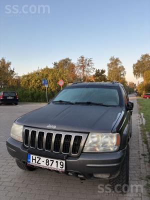 Pelēks Jeep Grand Cherokee 2003 Rīga, ar dzinēja tilpumu 2.70 L un nobraukumu 351 tūkst. km par 1485 €, foto  vietnē AUTOMOTO.COM.LV
