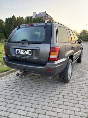 Pelēks Jeep Grand Cherokee 2003 Rīga, ar dzinēja tilpumu 2.70 L un nobraukumu 351 tūkst. km par 1485 €, foto 3 vietnē AUTOMOTO.COM.LV