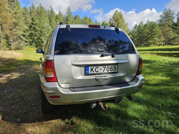 Pelēks Jeep Grand Cherokee 2003 Valka, ar dzinēja tilpumu 2.70 L un nobraukumu 305 tūkst. km par 2300 €, foto 4 vietnē AUTOMOTO.COM.LV