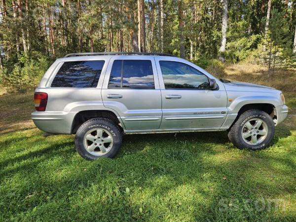 Grey Jeep Grand Cherokee 2003 in Valka, with an engine capacity of 2.70 L and mileage of 305 thousand km for 2300 €, photo 5 on AUTOMOTO.COM.LV