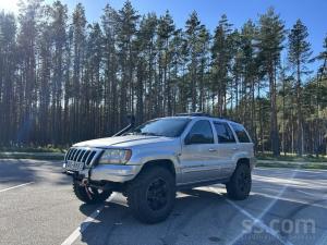 Grey Jeep Grand Cherokee 2003 in Riga, with an engine capacity of 2.70 L and mileage of 306 thousand km for 3950 €, photo 3 on AUTOMOTO.COM.LV