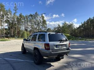 Grey Jeep Grand Cherokee 2003 in Riga, with an engine capacity of 2.70 L and mileage of 306 thousand km for 3950 €, photo 5 on AUTOMOTO.COM.LV