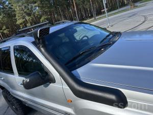 Grey Jeep Grand Cherokee 2003 in Riga, with an engine capacity of 2.70 L and mileage of 306 thousand km for 3950 €, photo 6 on AUTOMOTO.COM.LV