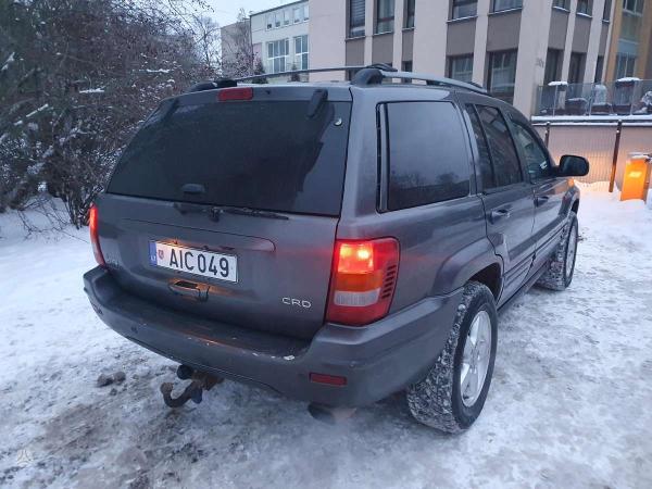 Grey Jeep Grand Cherokee 2004 in Kaunas, with an engine capacity of 2.70 L and mileage of 263 thousand km for 2950 €, photo 3 on AUTOMOTO.COM.LV