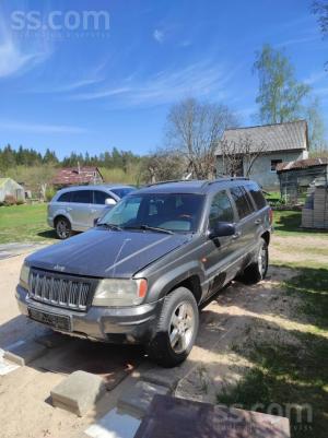 Grey Jeep Grand Cherokee 2004 in Riga, with an engine capacity of 2.70 L and mileage of 385 thousand km for 1500 €, photo  on AUTOMOTO.COM.LV