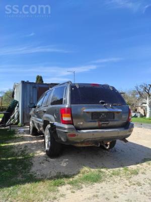 Grey Jeep Grand Cherokee 2004 in Riga, with an engine capacity of 2.70 L and mileage of 385 thousand km for 1500 €, photo 5 on AUTOMOTO.COM.LV