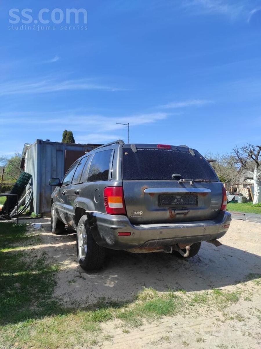 Grey Jeep Grand Cherokee 2004 in Riga, with an engine capacity of 2.70 L and mileage of 385 thousand km for 1500 €, photo 5 on AUTOMOTO.COM.LV
