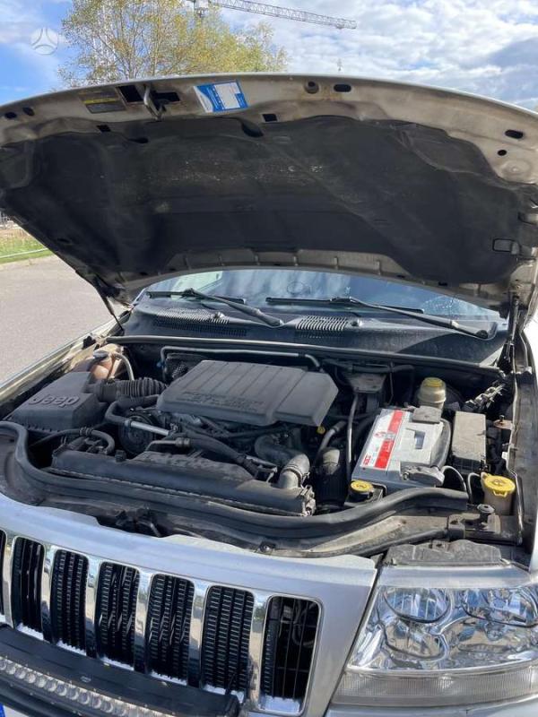 Pelēks Jeep Grand Cherokee 2004 Viļņa, ar dzinēja tilpumu 2.69 L un nobraukumu 193 tūkst. km par 7800 €, foto 3 vietnē AUTOMOTO.COM.LV