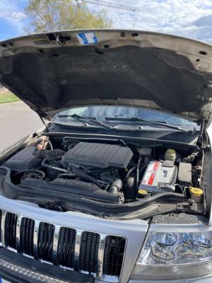 Pelēks Jeep Grand Cherokee 2004 Viļņa, ar dzinēja tilpumu 2.69 L un nobraukumu 193 tūkst. km par 7800 €, foto 3 vietnē AUTOMOTO.COM.LV