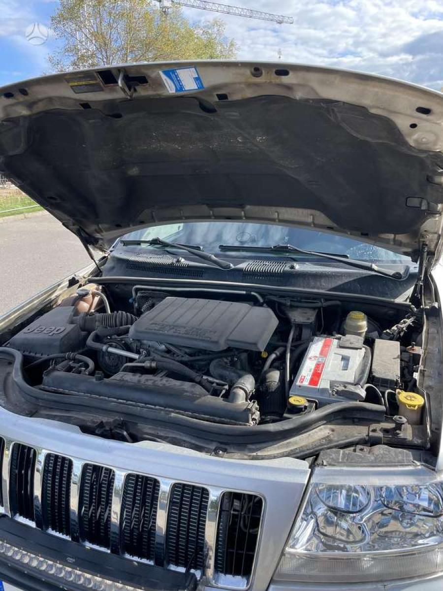 Pelēks Jeep Grand Cherokee 2004 Viļņa, ar dzinēja tilpumu 2.69 L un nobraukumu 193 tūkst. km par 7800 €, foto 3 vietnē AUTOMOTO.COM.LV