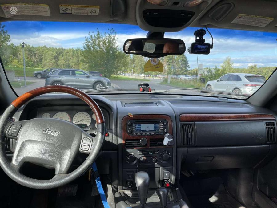 Pelēks Jeep Grand Cherokee 2004 Viļņa, ar dzinēja tilpumu 2.69 L un nobraukumu 193 tūkst. km par 7800 €, foto 6 vietnē AUTOMOTO.COM.LV