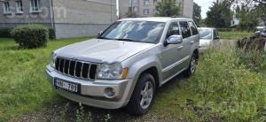 Pelēks Jeep Grand Cherokee 2005 Rēzekne, ar dzinēja tilpumu 3.00 L un nobraukumu 300 tūkst. km par 2500 €, foto  vietnē AUTOMOTO.COM.LV