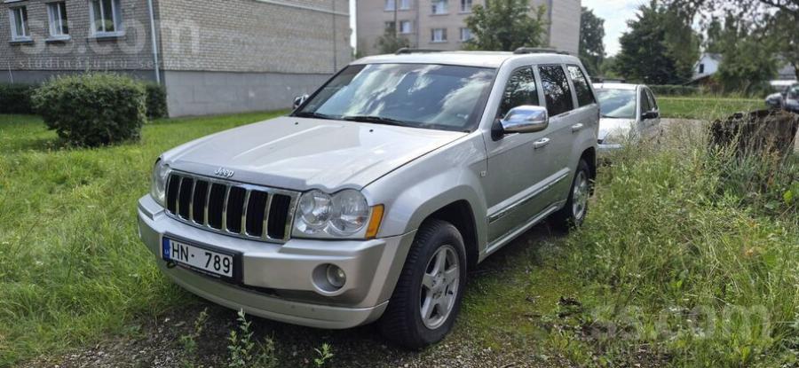 Pelēks Jeep Grand Cherokee 2005 Rēzekne, ar dzinēja tilpumu 3.00 L un nobraukumu 300 tūkst. km par 2500 €, foto 1 vietnē AUTOMOTO.COM.LV