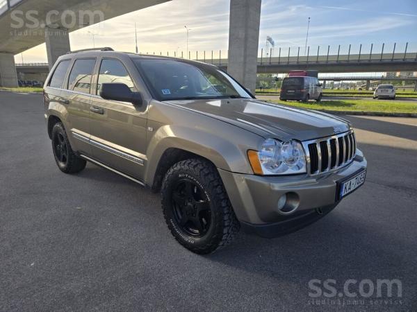 Pelēks Jeep Grand Cherokee 2006 Rīga, ar dzinēja tilpumu 3.00 L un nobraukumu 356 tūkst. km par 24990 €, foto 2 vietnē AUTOMOTO.COM.LV