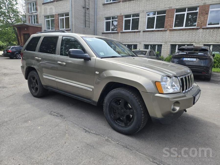 Pelēks Jeep Grand Cherokee 2006 Rīga, ar dzinēja tilpumu 3.00 L un nobraukumu 365 tūkst. km par 3600 €, foto 2 vietnē AUTOMOTO.COM.LV