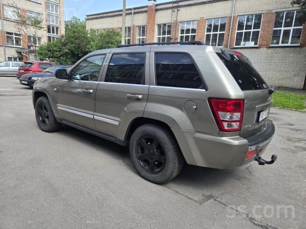 Pelēks Jeep Grand Cherokee 2006 Rīga, ar dzinēja tilpumu 3.00 L un nobraukumu 365 tūkst. km par 3600 €, foto 4 vietnē AUTOMOTO.COM.LV