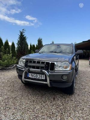Pelēks Jeep Grand Cherokee 2006 Kauņa, ar dzinēja tilpumu 3.00 L un nobraukumu 258 tūkst. km par 5000 €, foto  vietnē AUTOMOTO.COM.LV