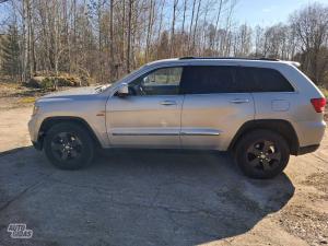 Grey Jeep Grand Cherokee 2011 in Vilnius, with an engine capacity of 3.60 L and mileage of 210 thousand km for 11000 €, photo 12 on AUTOMOTO.COM.LV