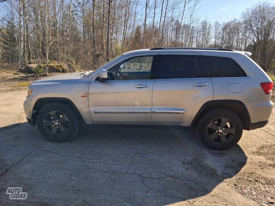 Grey Jeep Grand Cherokee 2011 in Vilnius, with an engine capacity of 3.60 L and mileage of 210 thousand km for 11000 €, photo 12 on AUTOMOTO.COM.LV
