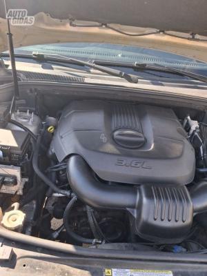 Grey Jeep Grand Cherokee 2011 in Visaginas, with an engine capacity of 3.60 L and mileage of 211 thousand km for 10300 €, photo 14 on AUTOMOTO.COM.LV