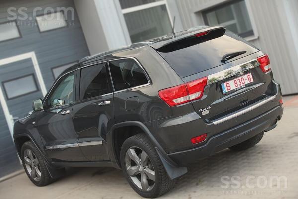 Grey Jeep Grand Cherokee 2011 in Riga, with an engine capacity of 3.60 L and mileage of 0 thousand km for 11950 €, photo 4 on AUTOMOTO.COM.LV
