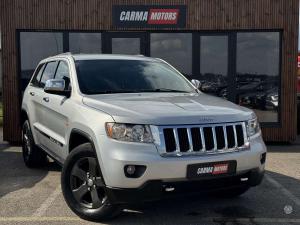 Pelēks Jeep Grand Cherokee 2011 Viļņa, ar dzinēja tilpumu 3.60 L un nobraukumu 216 tūkst. km par 6990 €, foto  vietnē AUTOMOTO.COM.LV
