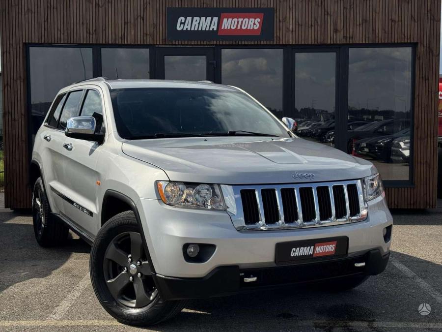 Pelēks Jeep Grand Cherokee 2011 Viļņa, ar dzinēja tilpumu 3.60 L un nobraukumu 216 tūkst. km par 6990 €, foto 1 vietnē AUTOMOTO.COM.LV