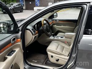 Pelēks Jeep Grand Cherokee 2012 Rīga, ar dzinēja tilpumu 3.00 L un nobraukumu 262 tūkst. km par 8399 €, foto 30 vietnē AUTOMOTO.COM.LV