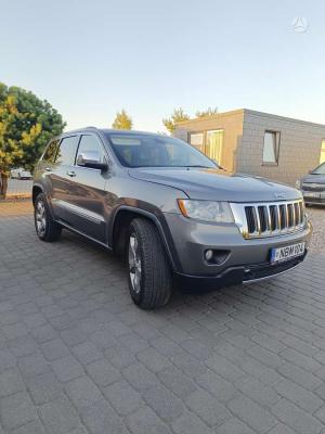 Grey Jeep Grand Cherokee 2012 in Vilnius, with an engine capacity of 5.70 L and mileage of 229 thousand km for 12900 €, photo 3 on AUTOMOTO.COM.LV
