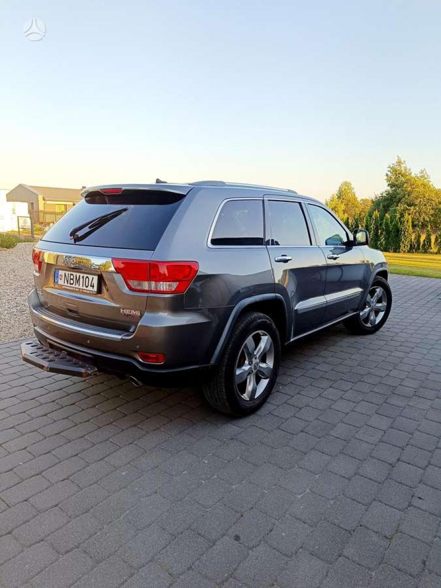 Grey Jeep Grand Cherokee 2012 in Vilnius, with an engine capacity of 5.70 L and mileage of 229 thousand km for 12900 €, photo 4 on AUTOMOTO.COM.LV