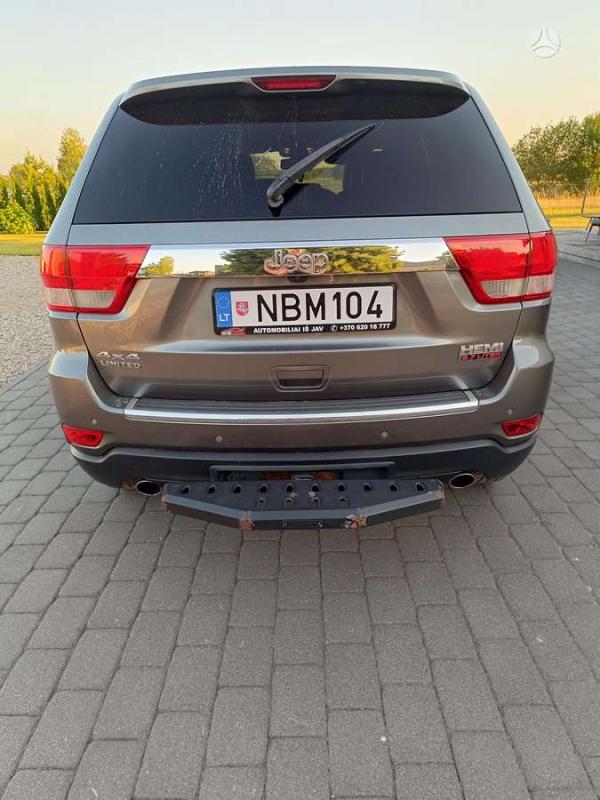 Grey Jeep Grand Cherokee 2012 in Vilnius, with an engine capacity of 5.70 L and mileage of 229 thousand km for 12900 €, photo 5 on AUTOMOTO.COM.LV