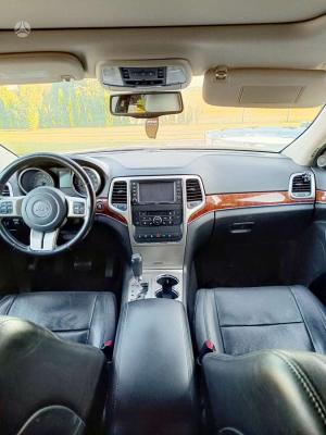 Grey Jeep Grand Cherokee 2012 in Vilnius, with an engine capacity of 5.70 L and mileage of 229 thousand km for 12900 €, photo 7 on AUTOMOTO.COM.LV