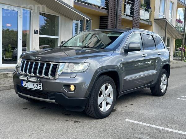 Pelēks Jeep Grand Cherokee 2012 Rīga, ar dzinēja tilpumu 3.00 L un nobraukumu 280 tūkst. km par 7990 €, foto 1 vietnē AUTOMOTO.COM.LV