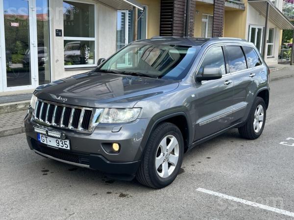 Pelēks Jeep Grand Cherokee 2012 Rīga, ar dzinēja tilpumu 3.00 L un nobraukumu 280 tūkst. km par 7990 €, foto 2 vietnē AUTOMOTO.COM.LV