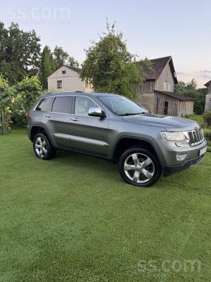 Pelēks Jeep Grand Cherokee 2012 Ogre, ar dzinēja tilpumu 3.00 L un nobraukumu 269 tūkst. km par 8500 €, foto  vietnē AUTOMOTO.COM.LV