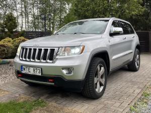 Pelēks Jeep Grand Cherokee 2013 Kauņa, ar dzinēja tilpumu 5.70 L un nobraukumu 336 tūkst. km par 12800 €, foto  vietnē AUTOMOTO.COM.LV