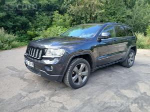 Pelēks Jeep Grand Cherokee 2013 Rīga, ar dzinēja tilpumu 3.00 L un nobraukumu 179 tūkst. km par 9500 €, foto 3 vietnē AUTOMOTO.COM.LV