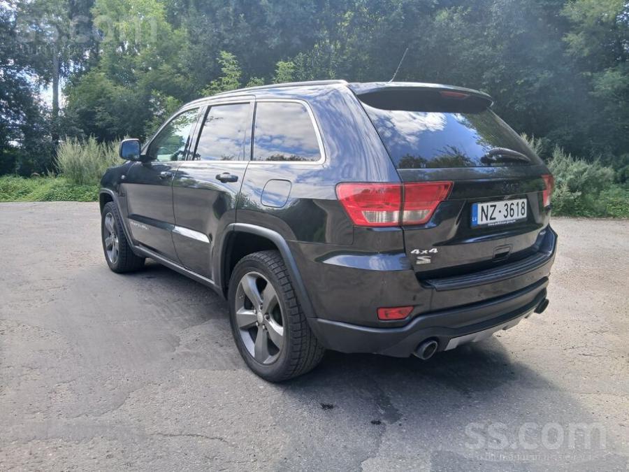 Pelēks Jeep Grand Cherokee 2013 Rīga, ar dzinēja tilpumu 3.00 L un nobraukumu 179 tūkst. km par 9500 €, foto 5 vietnē AUTOMOTO.COM.LV
