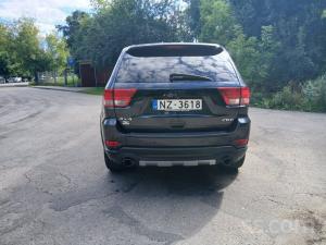 Pelēks Jeep Grand Cherokee 2013 Rīga, ar dzinēja tilpumu 3.00 L un nobraukumu 179 tūkst. km par 9500 €, foto 6 vietnē AUTOMOTO.COM.LV