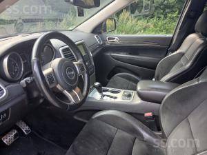 Pelēks Jeep Grand Cherokee 2013 Rīga, ar dzinēja tilpumu 3.00 L un nobraukumu 179 tūkst. km par 9500 €, foto 10 vietnē AUTOMOTO.COM.LV