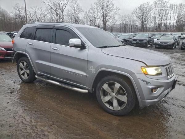 Grey Jeep Grand Cherokee 2014 in Kaunas, with an engine capacity of 5.70 L and mileage of 261 thousand km for 10700 €, photo 1 on AUTOMOTO.COM.LV