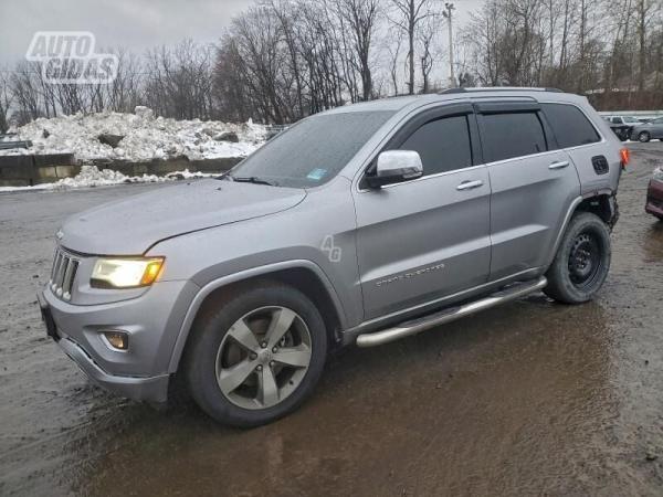 Grey Jeep Grand Cherokee 2014 in Kaunas, with an engine capacity of 5.70 L and mileage of 261 thousand km for 10700 €, photo 2 on AUTOMOTO.COM.LV